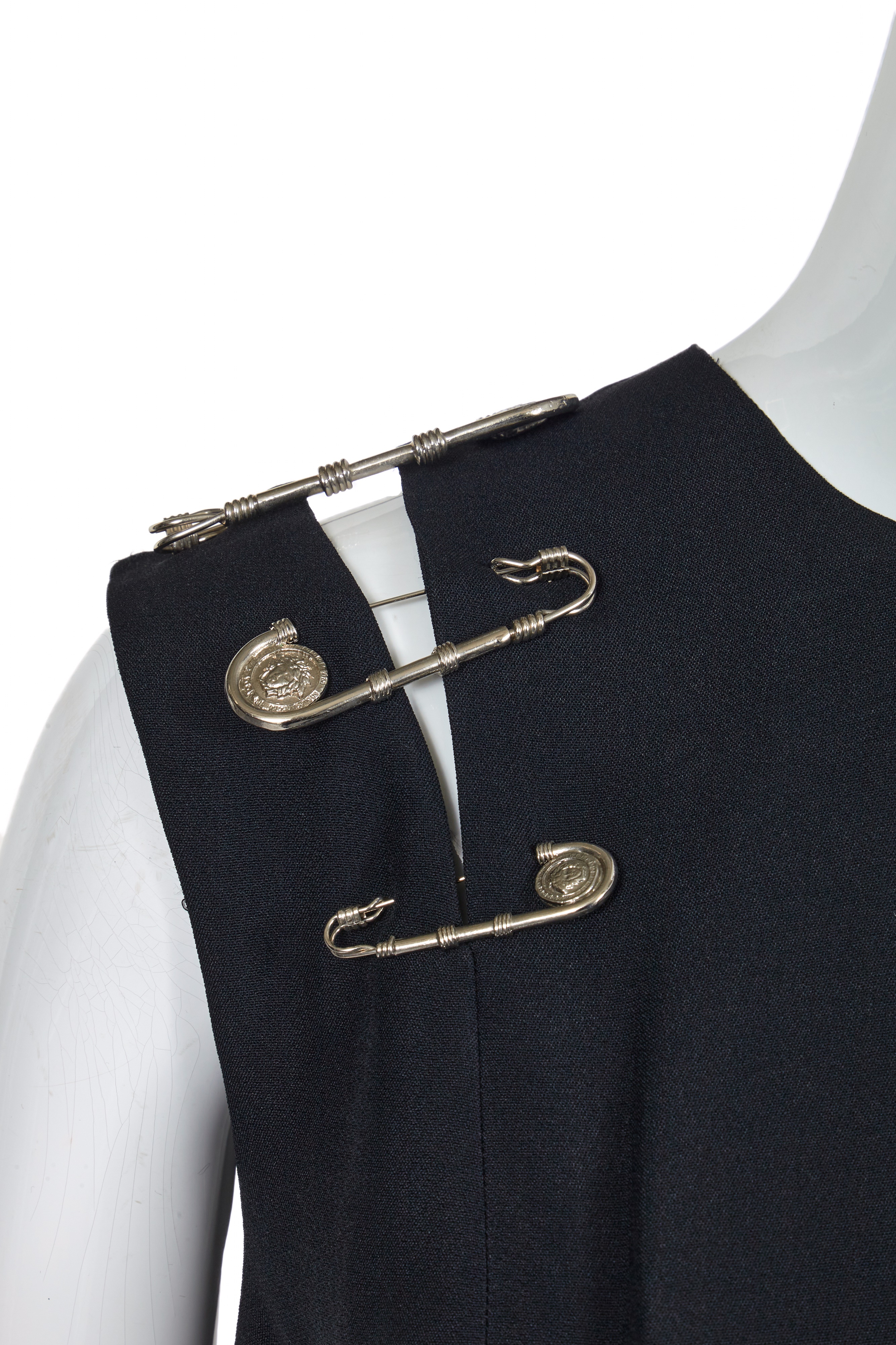 Lot 278 - A Gianni Versace black 'safety pin' dress,