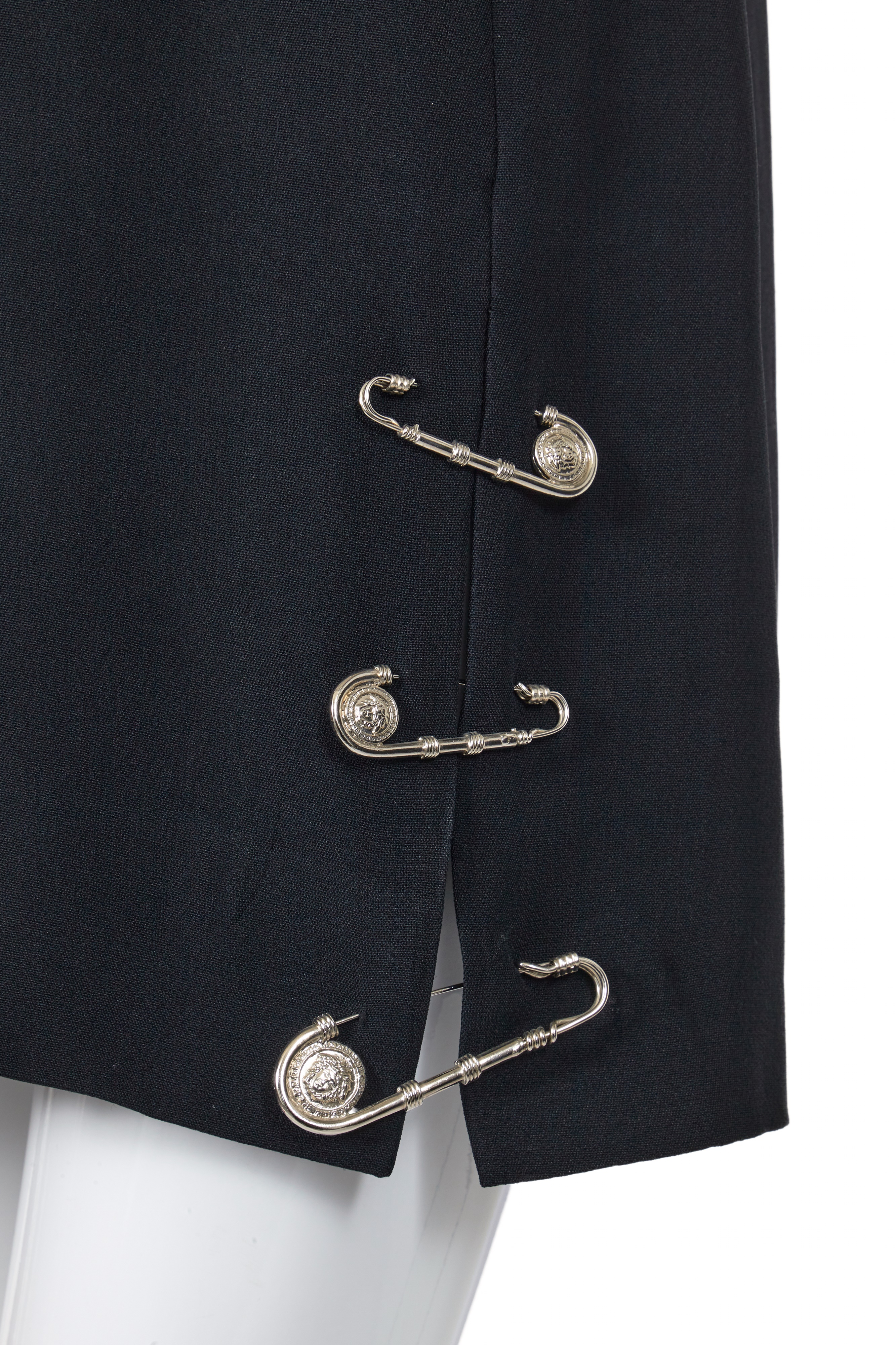 Lot 278 - A Gianni Versace black 'safety pin' dress,